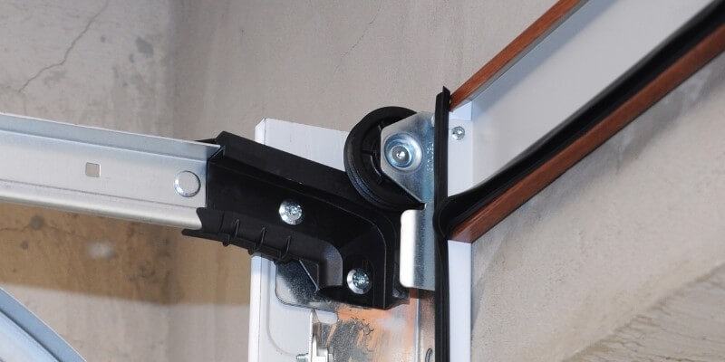 How to Replace Garage Door Track - INSCMagazine